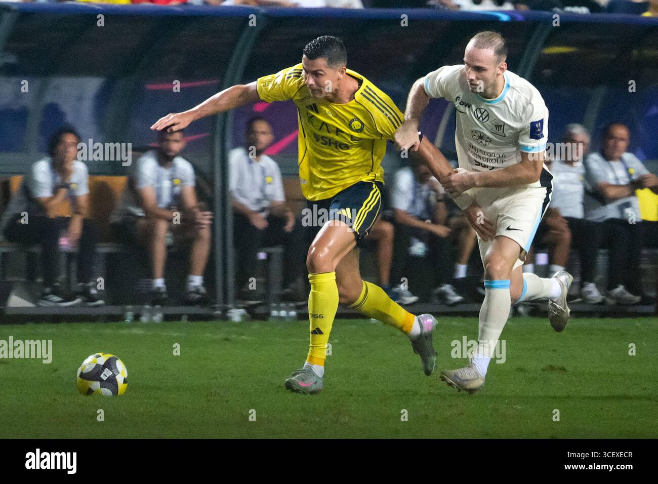 Al Nassr player Cristiano Ronaldo (in yellow jersey) attacks during the ...
