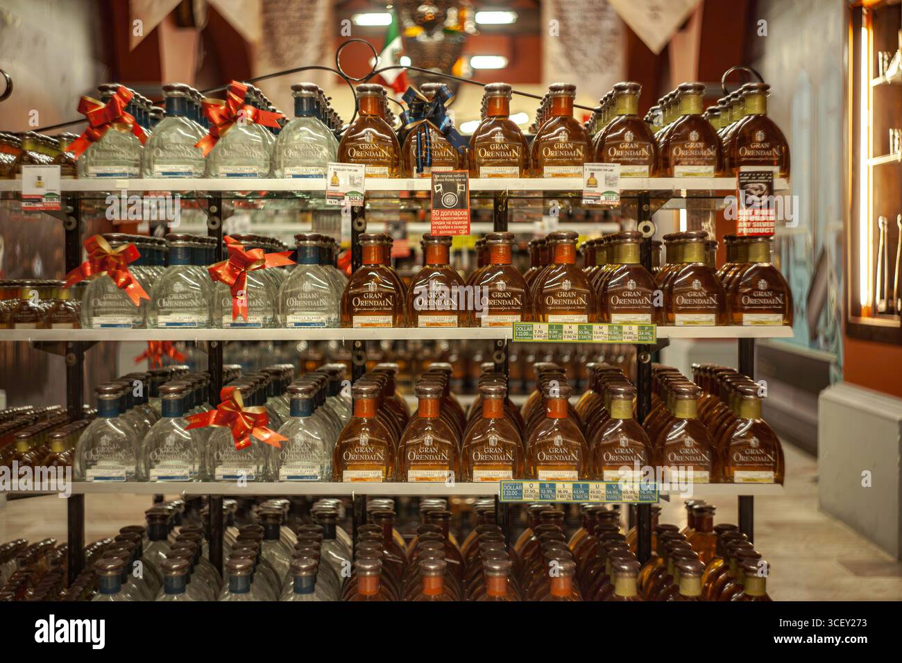 Tulum, mexico 20 august 2025: bottles of gran centenario tequila, some ...