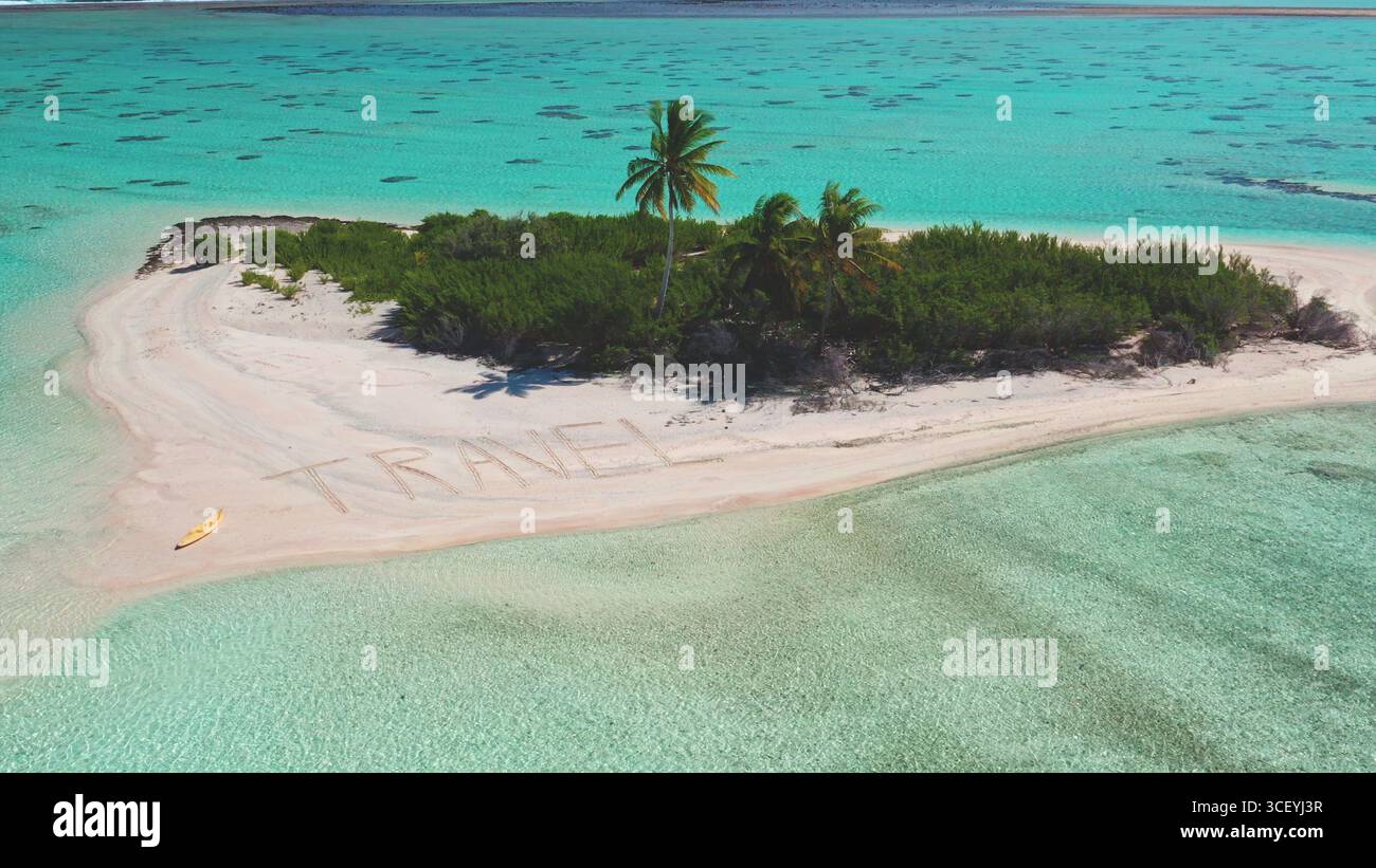 Crystal clear turquoise waters surround a small sandy island featuring ...