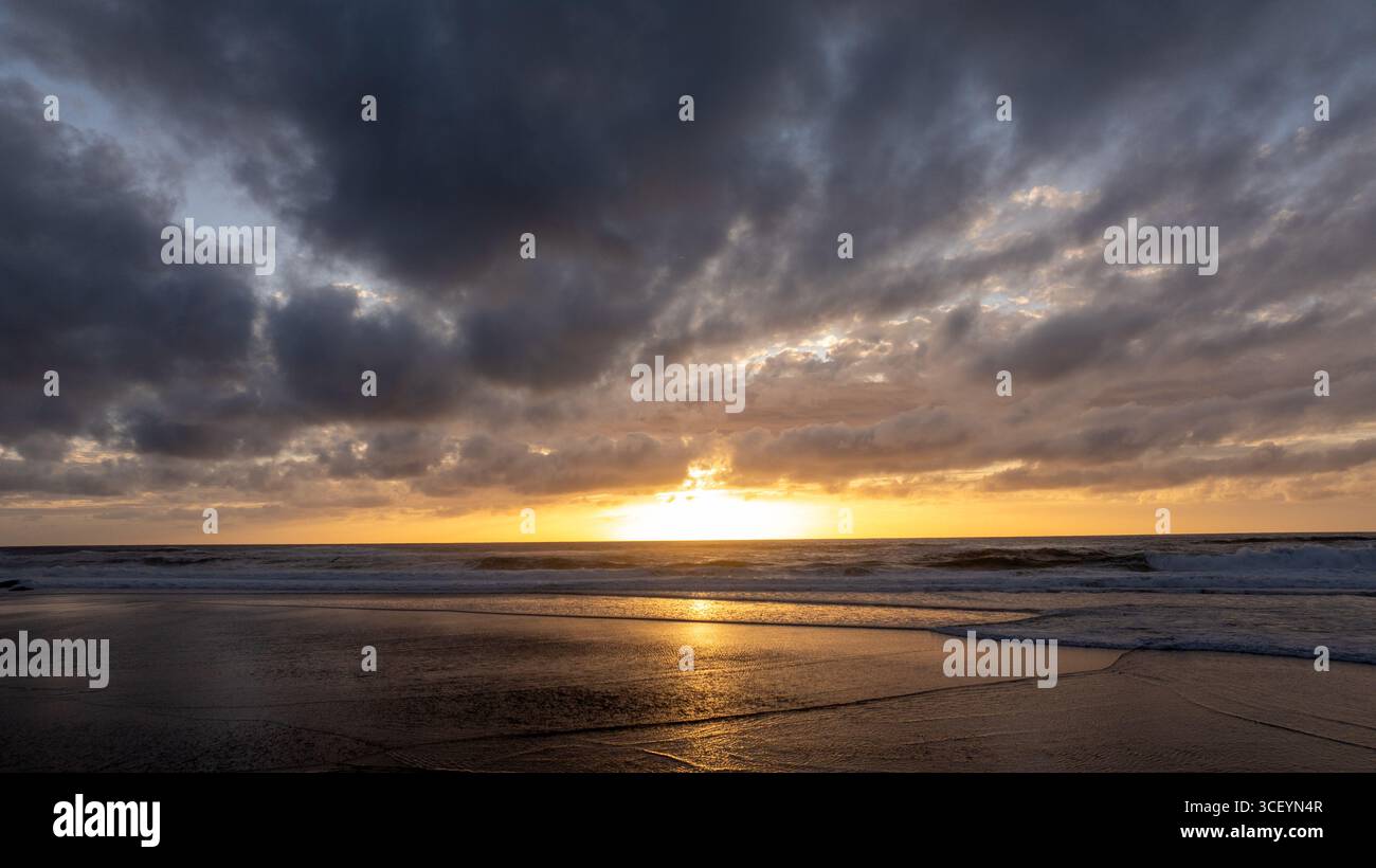 Golden sky over praia hi-res stock photography and images - Alamy