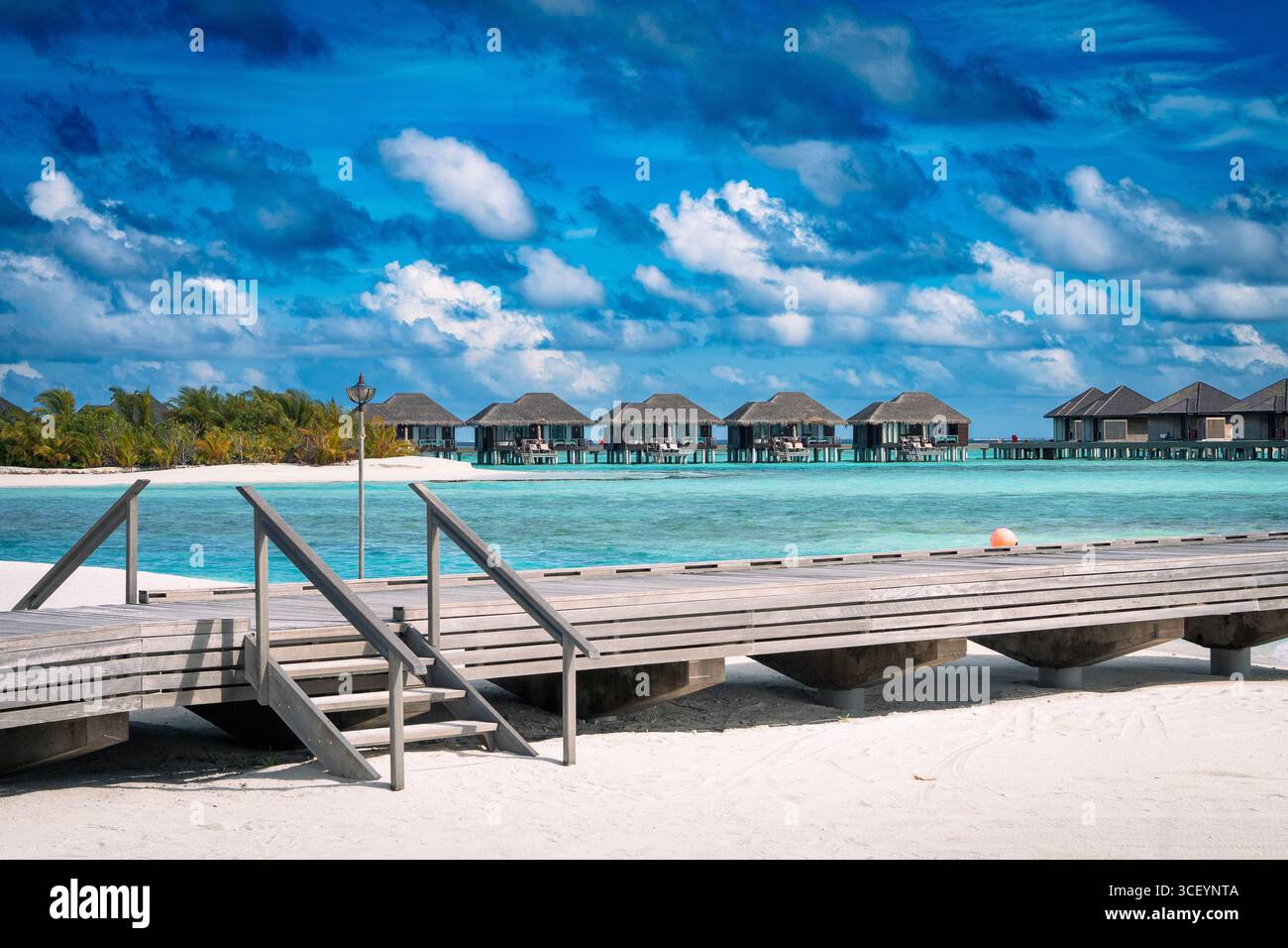 Modern wooden villas built on water in Maldives, tropical architectural ...
