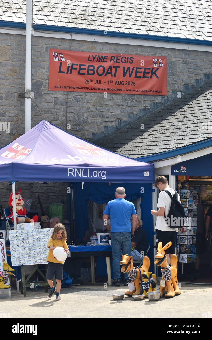 RNLI Stand Lifeboat Week at Lyme Regis Dorset England uk 30 th July ...