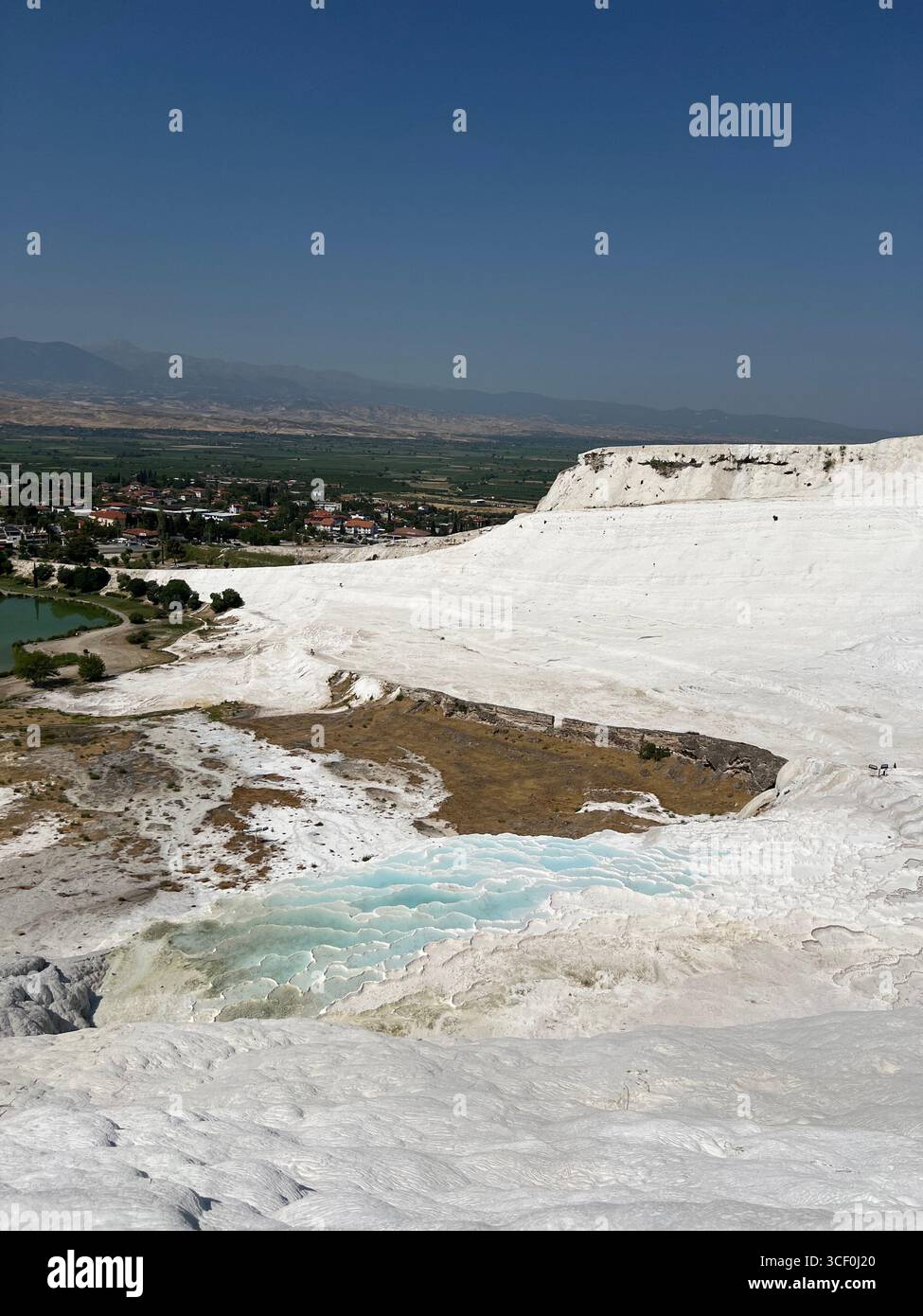 Blue pools on snowy-white cliffs – only in Pamukkale Stock Photo - Alamy