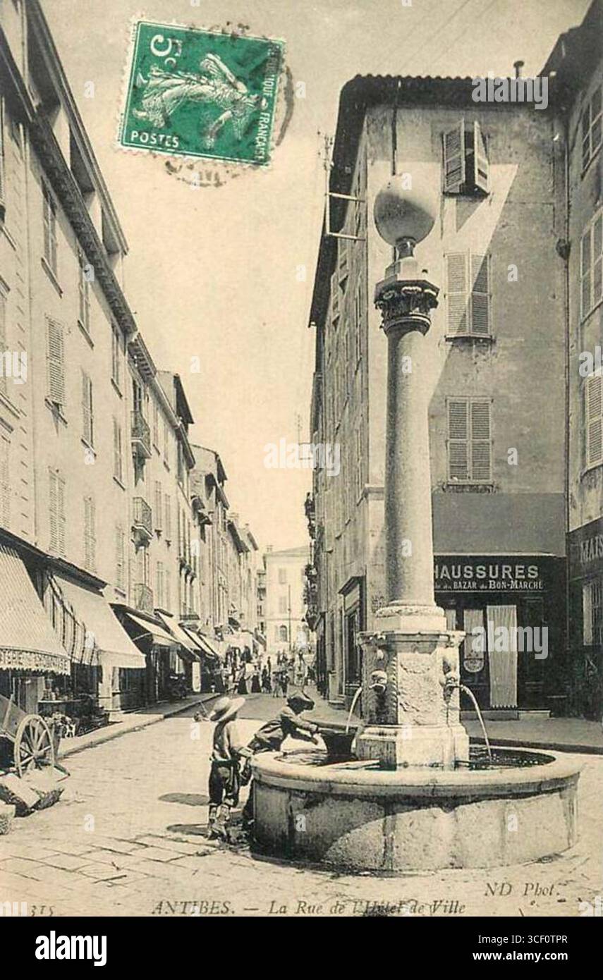 A circa 1900 photograph of Rue de l'Hôtel-de-Ville in Antibes, France ...