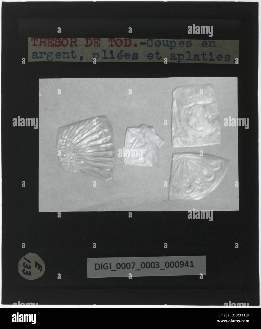 Fragments of silver bowls from the Temple of Montu in El-Tod, shown in ...