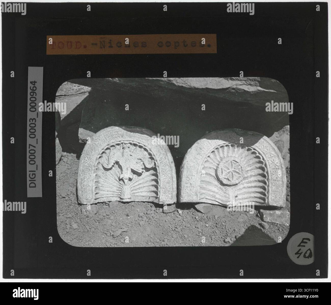Two niches decorated with reliefs in El-Tod, captured in a glass ...