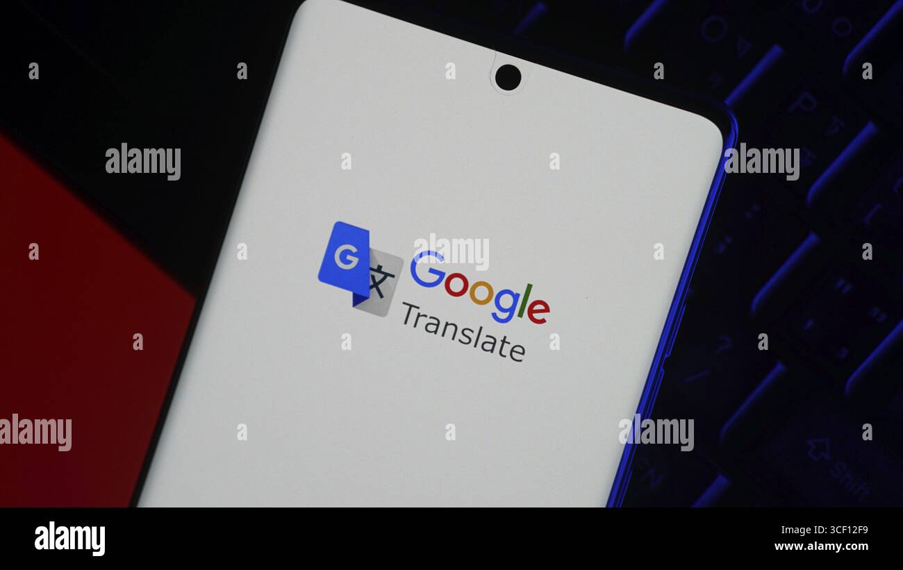 Google Translate logo shown on a smartphone with a minimalist white ...