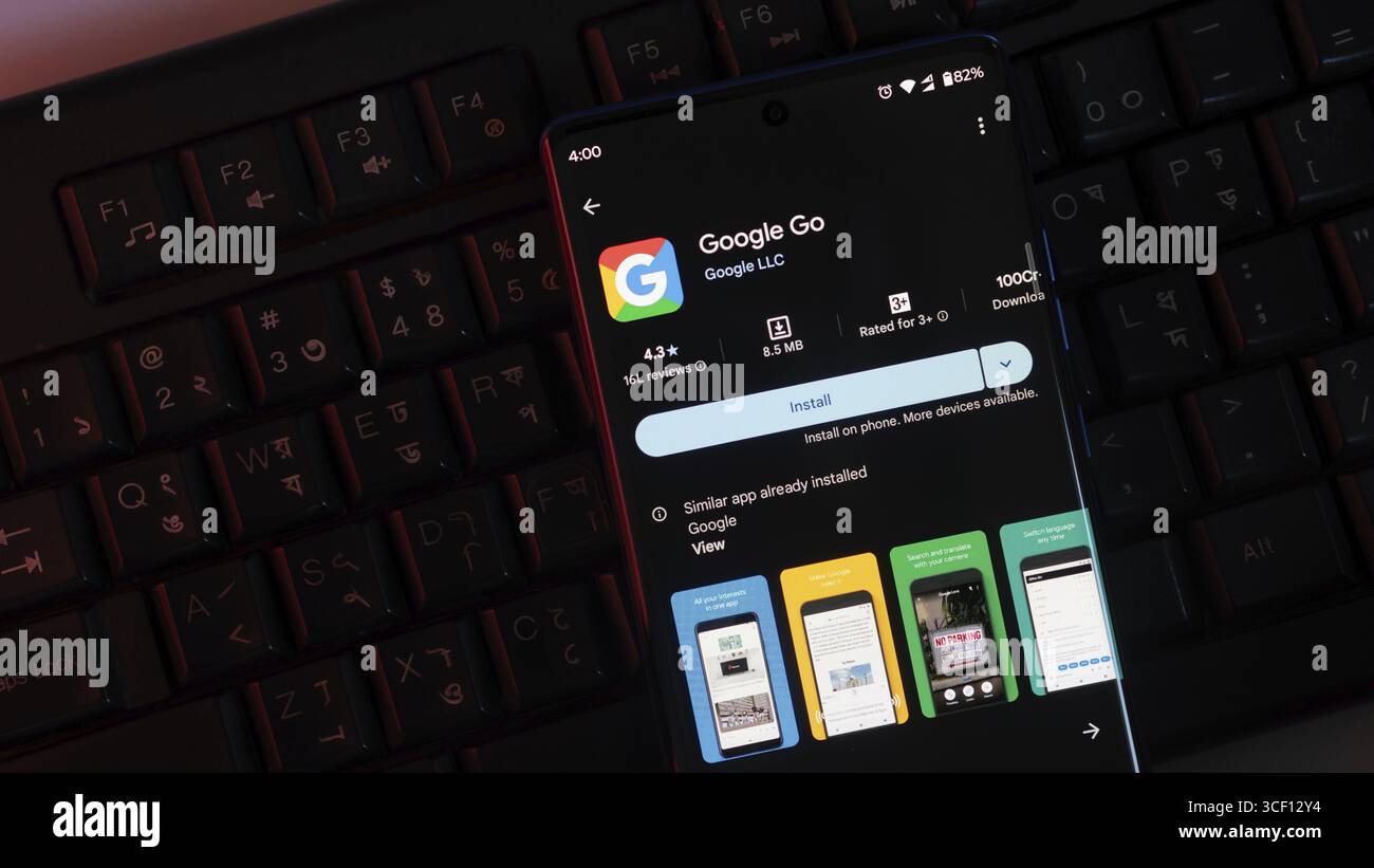 Google Go app on a smartphone screen over a keyboard, highlighting ...