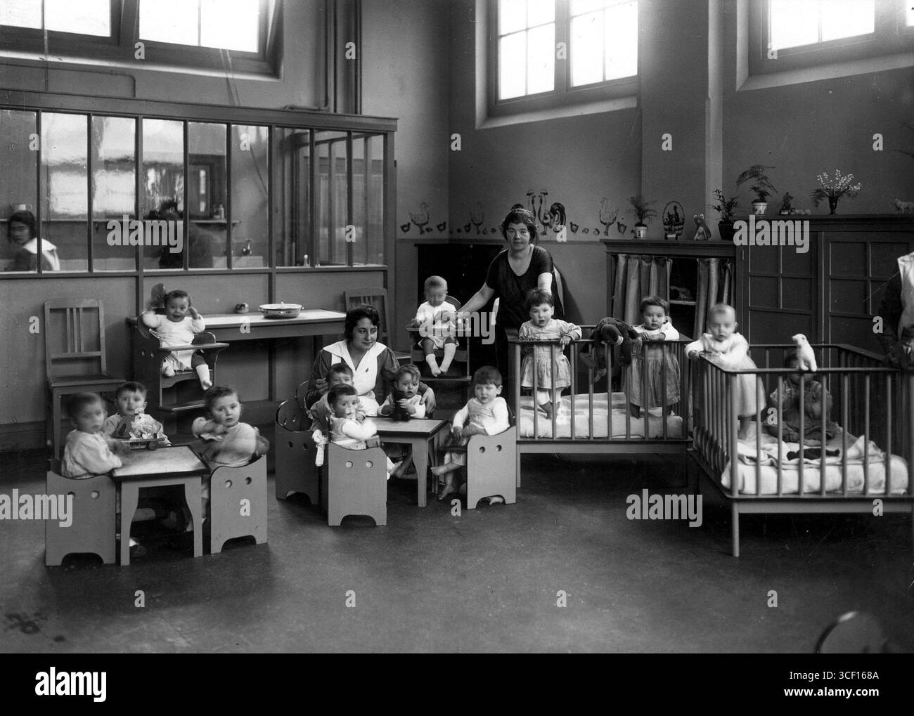 Mother child daycare Black and White Stock Photos & Images - Alamy