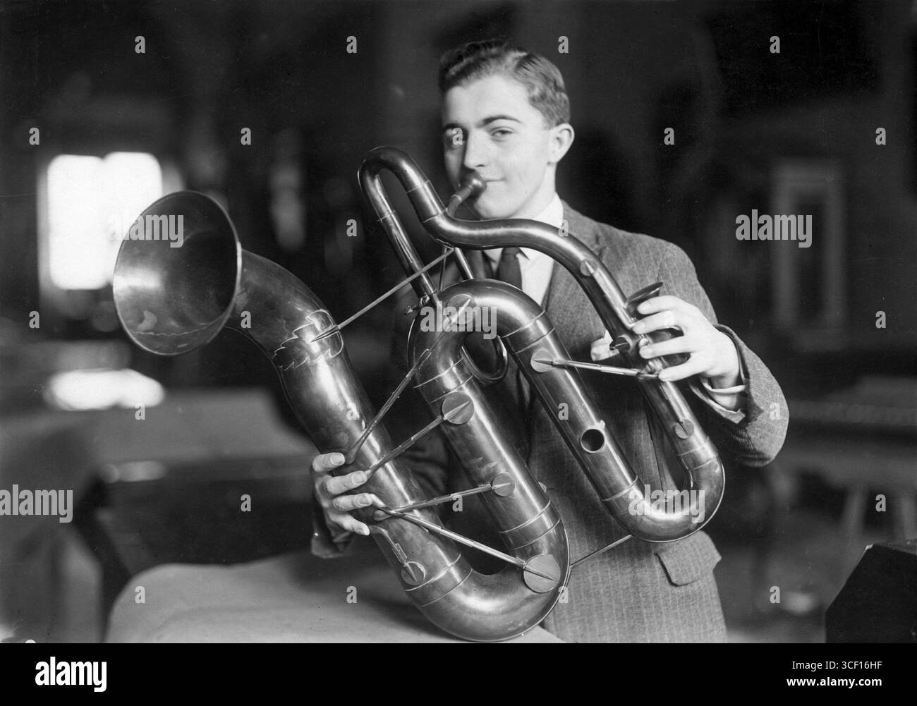 A man plays a rare wind instrument, a primitive predecessor to the ...