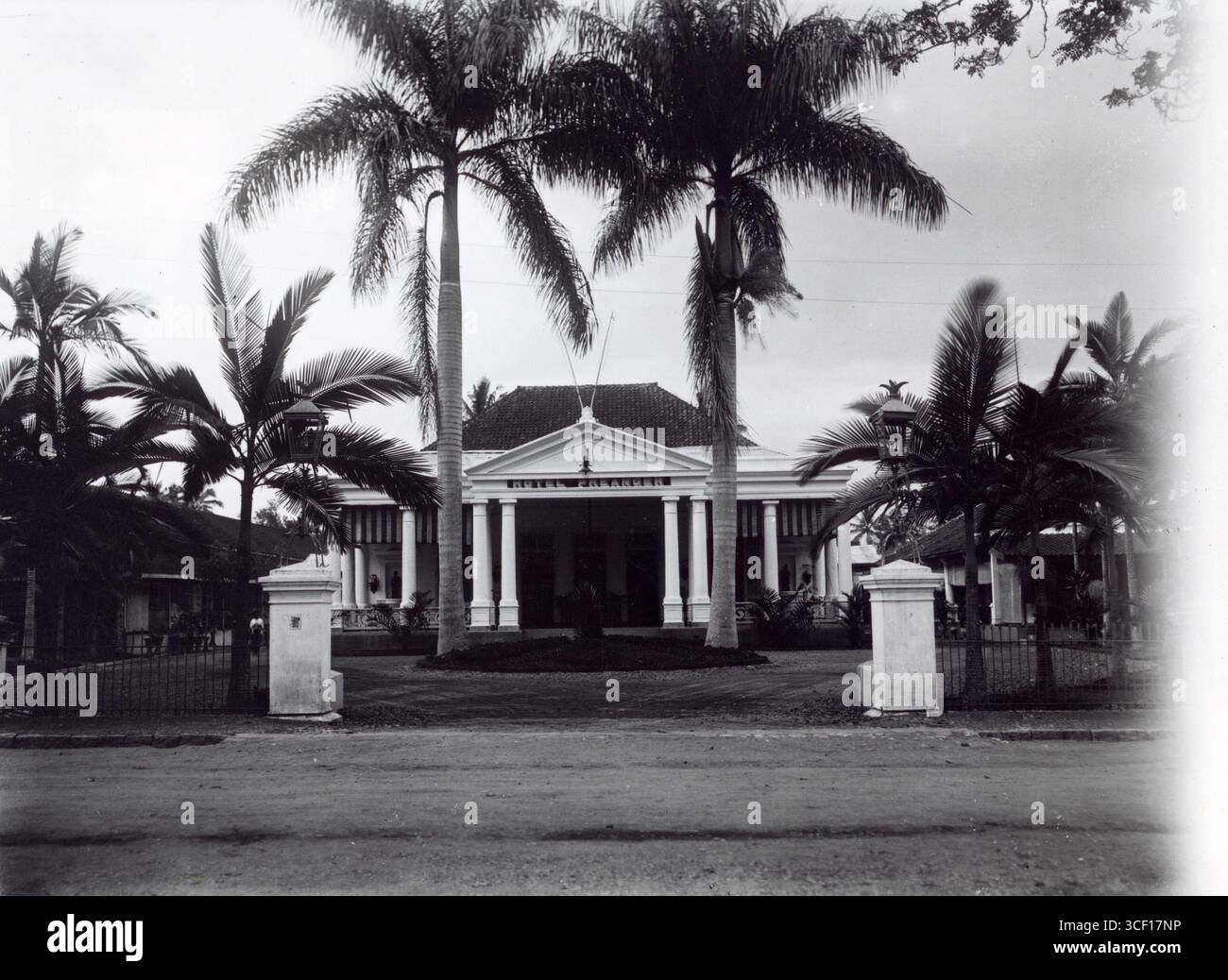 This image shows the front view of Hotel Preanger, a neo-classical ...