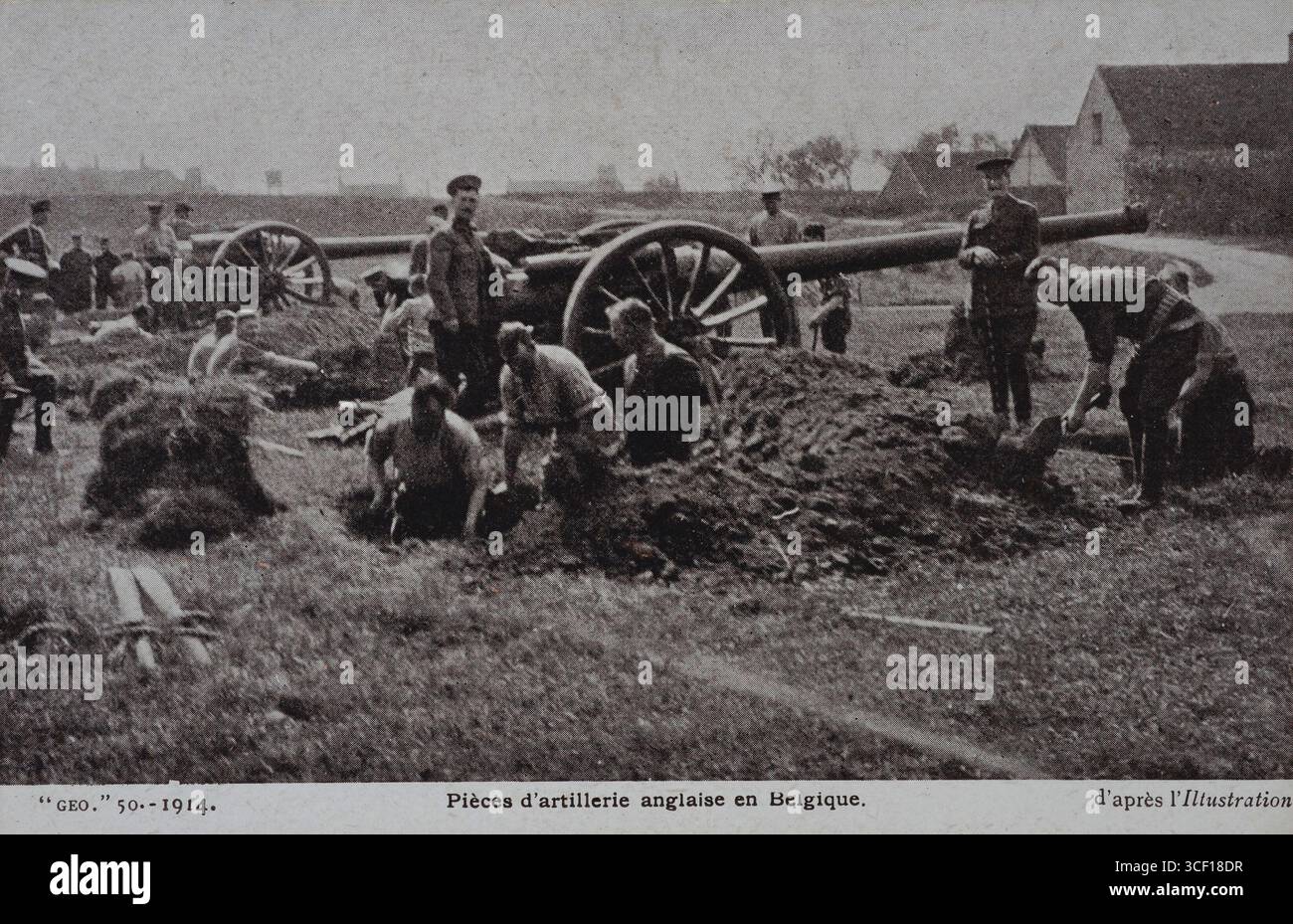 British artillery in Belgium, 1914. Soldiers dig trenches while ...