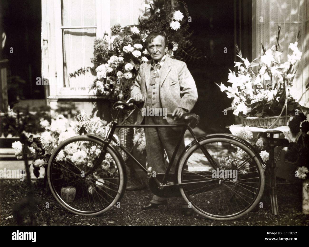 Louis Bouwmeester Sr. (1842-1925) is pictured with a bicycle given to ...