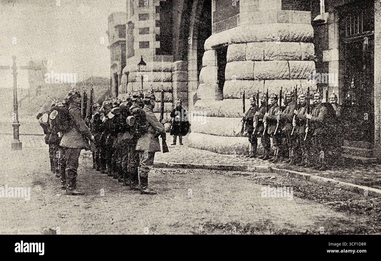 In December 1914, German soldiers conduct a shift change outside the ...