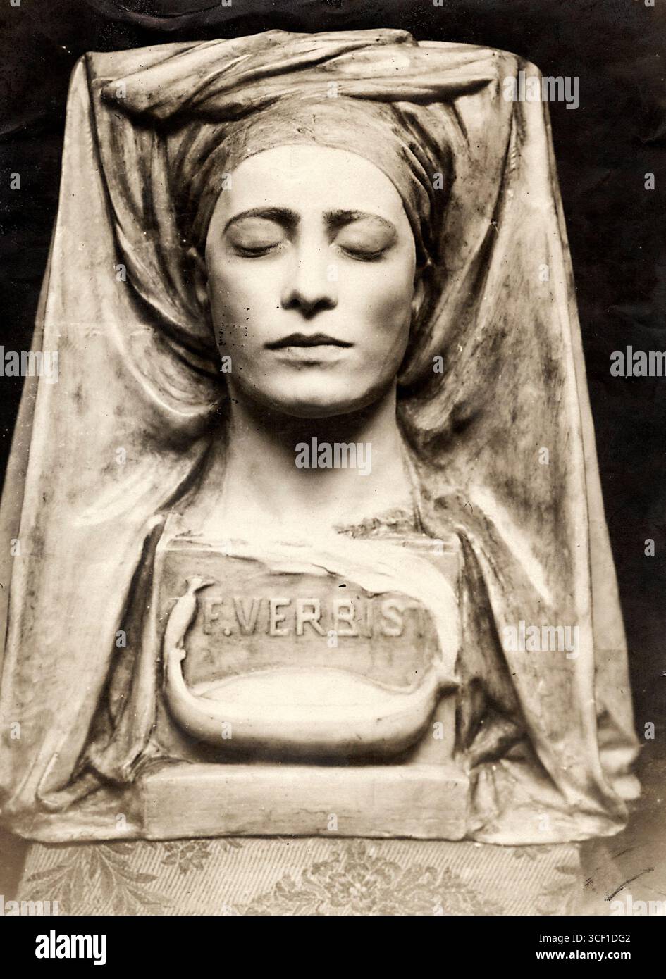 Making plaster masks: A plaster sculpture of a woman, where the face is ...