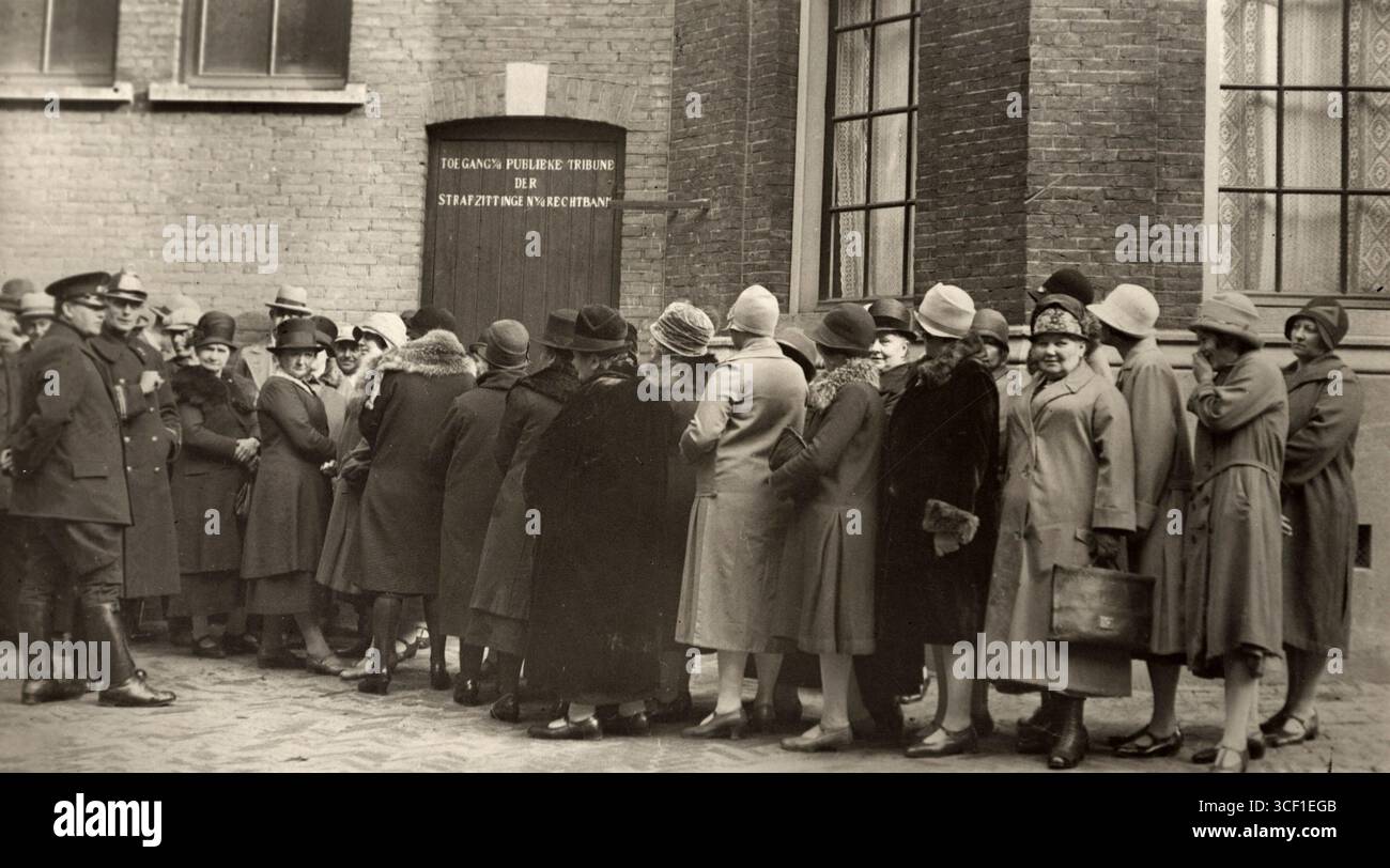 A line of women and one man wait in line to take seats in the public ...