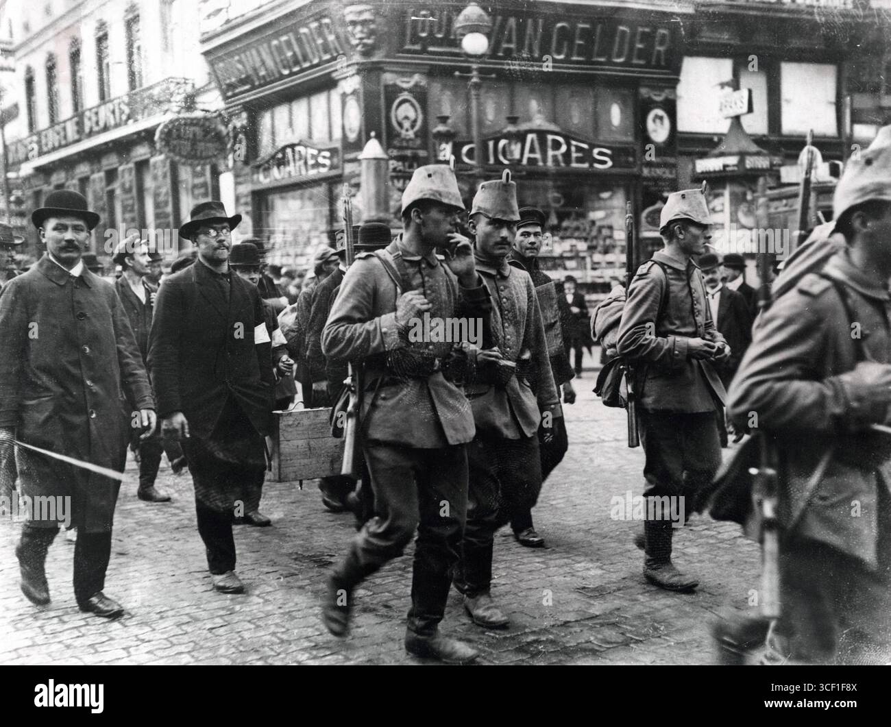 During World War I, German soldiers march along Boulevard Anspach in ...