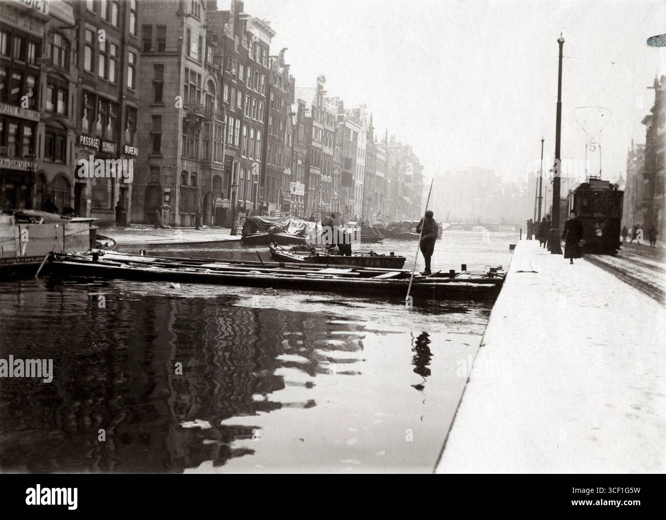 The Rokin in Amsterdam before infill, showing dredging work being ...