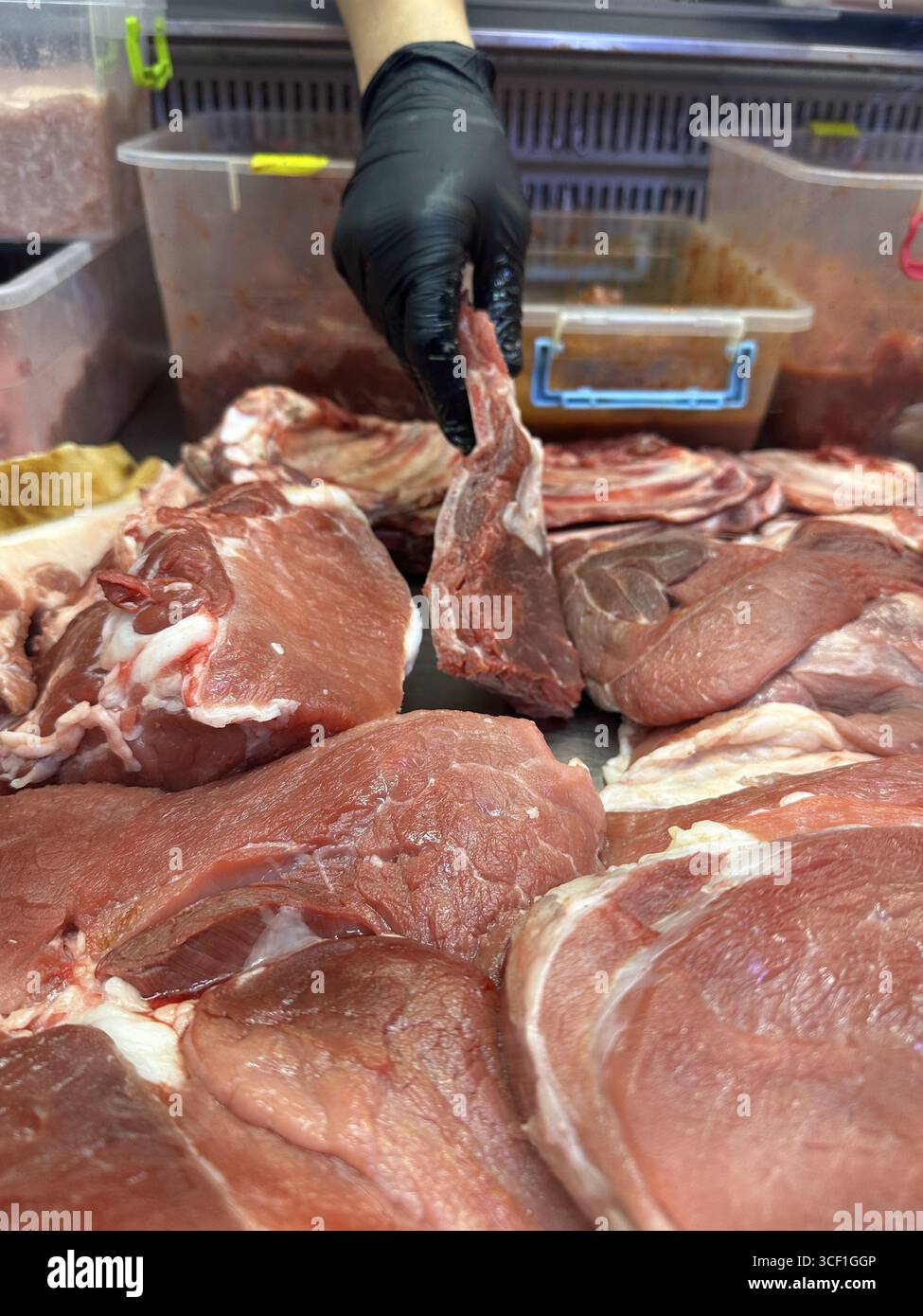 display case with fresh pork tenderloin closeup Stock Photo - Alamy