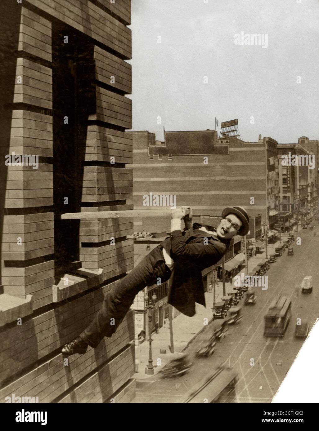 Harold Lloyd stars in the 1923 film 'Safety Last!' where he performs ...