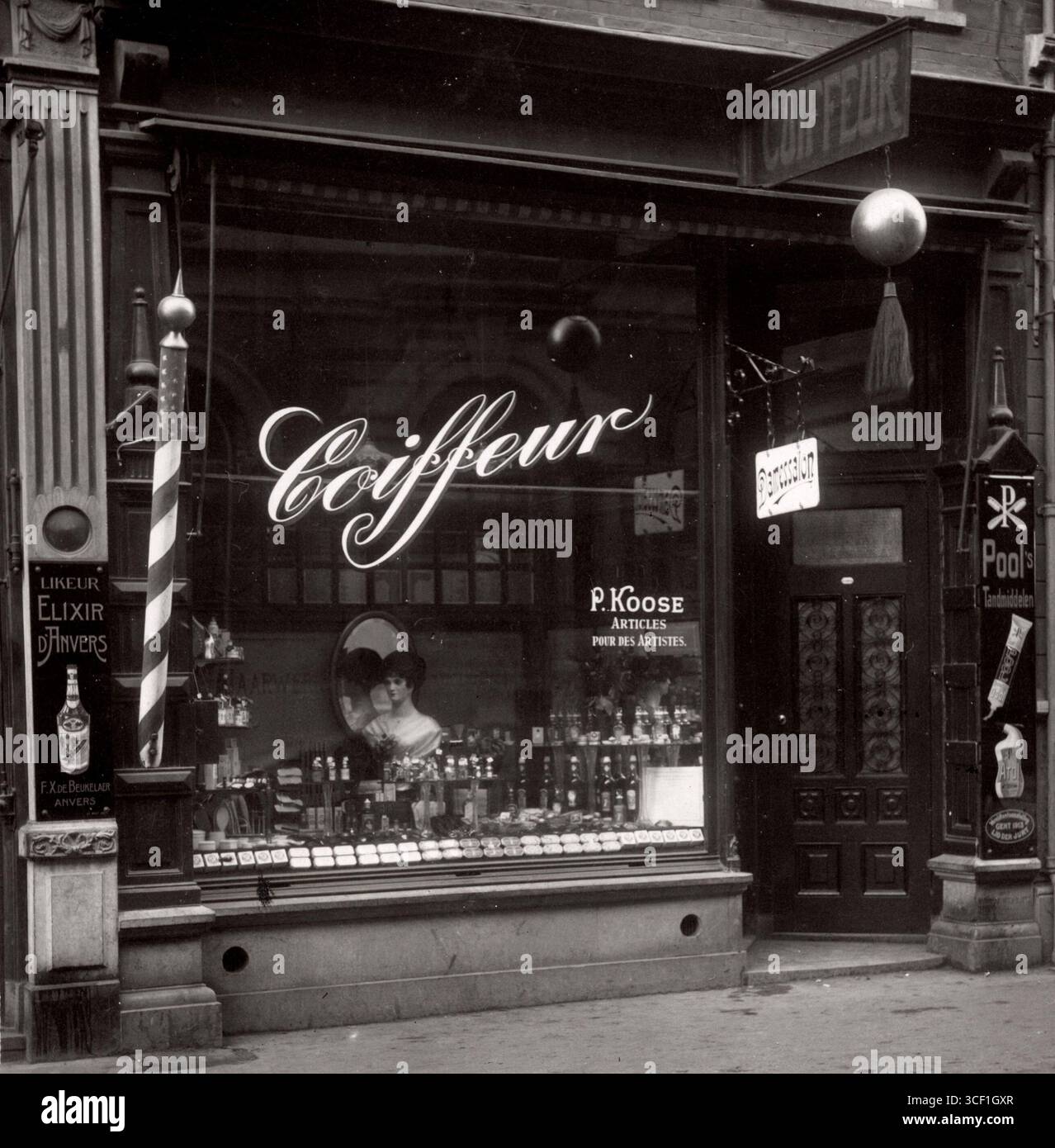The P. Koose barbershop at Amstelstraat 37 in Amsterdam, 1917. The shop ...