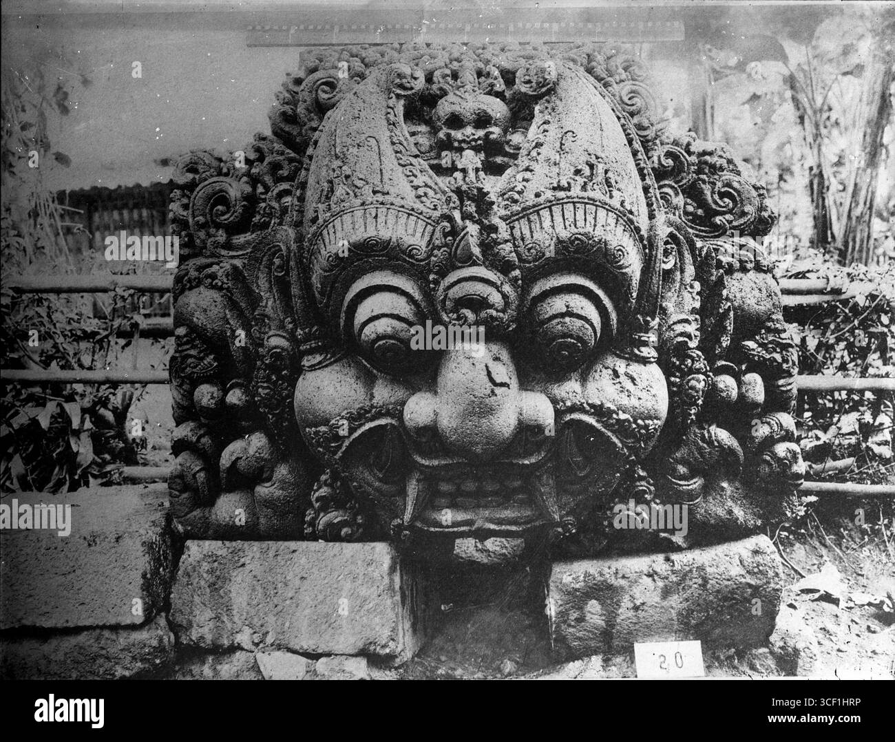 A detailed view of a temple in Java, Indonesia, featuring a Kalakop ...