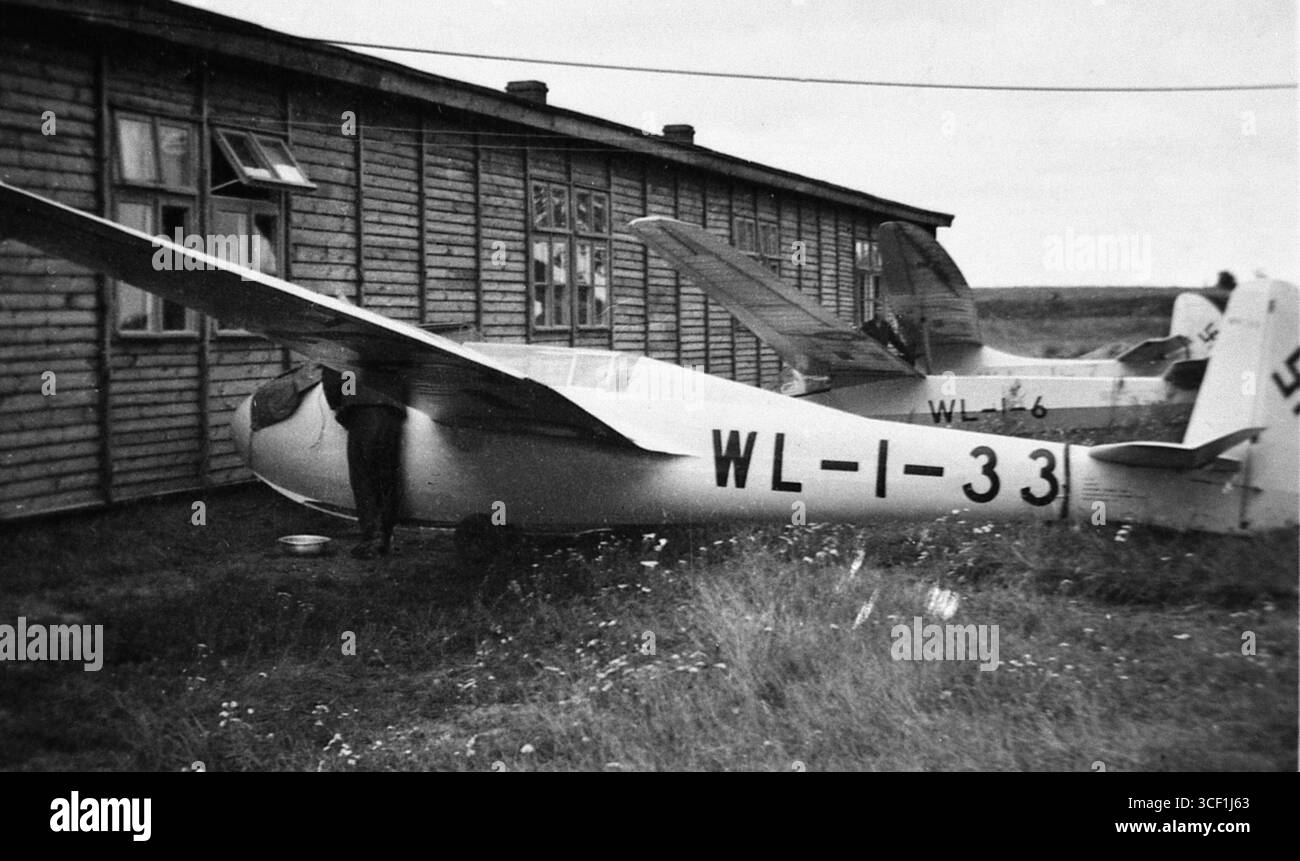 This photo shows the DFS Kranich II glider being towed by a Heinkel He ...