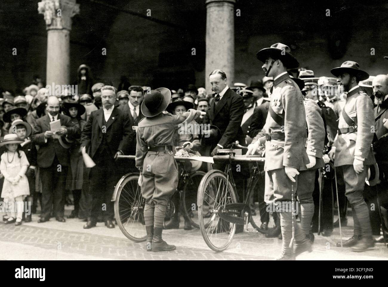 Italian scouts participate in a ceremony at a castle in Milan in 1915 ...