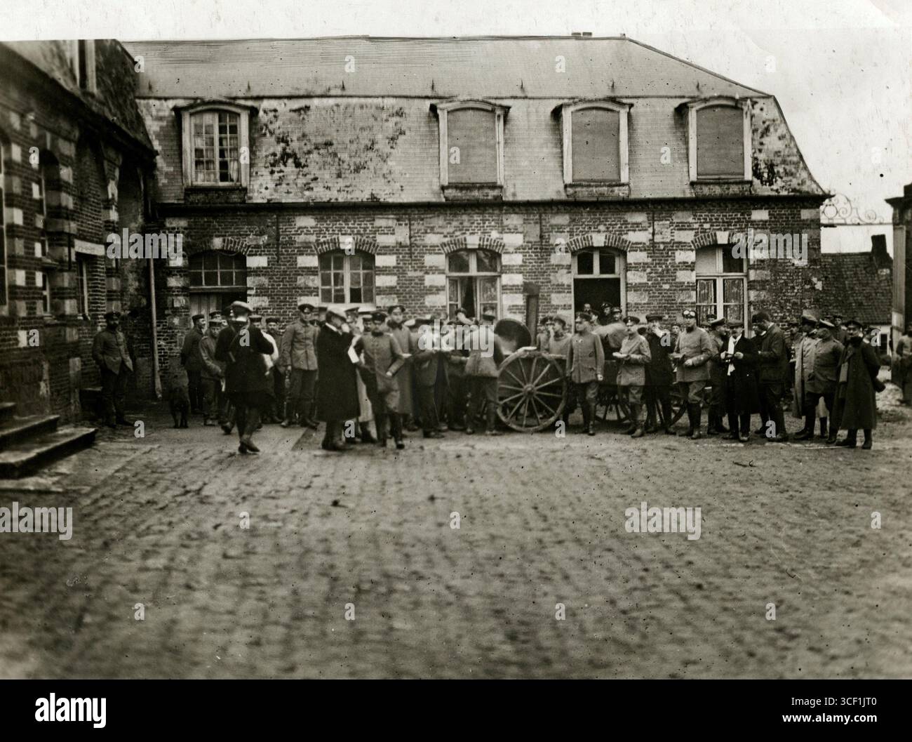 German soldiers receive supplies at a field kitchen in France during ...