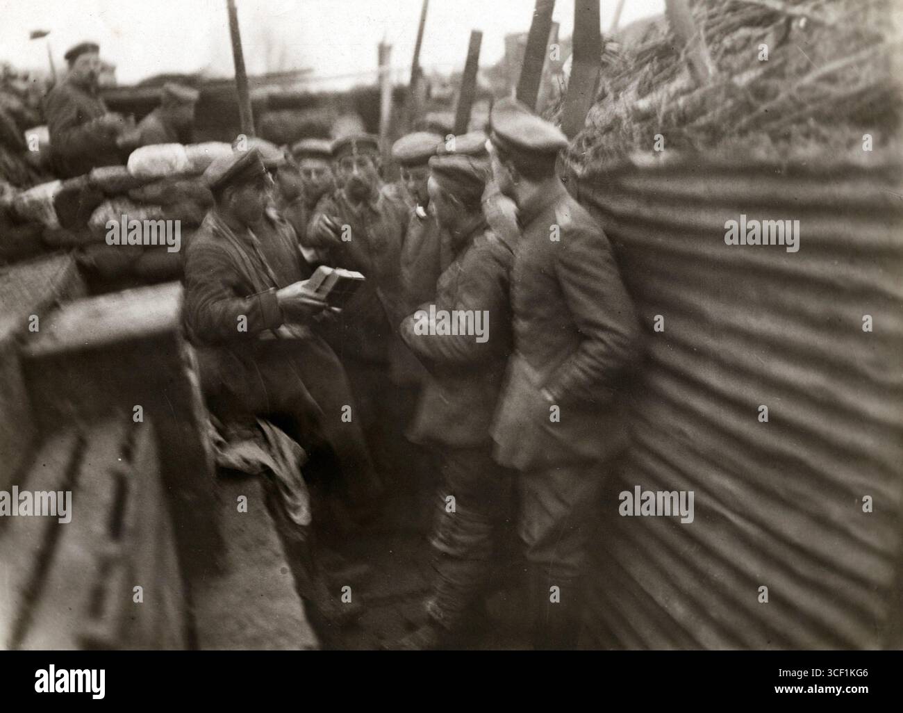 German soldiers at the Western Front receiving mail from a postman ...