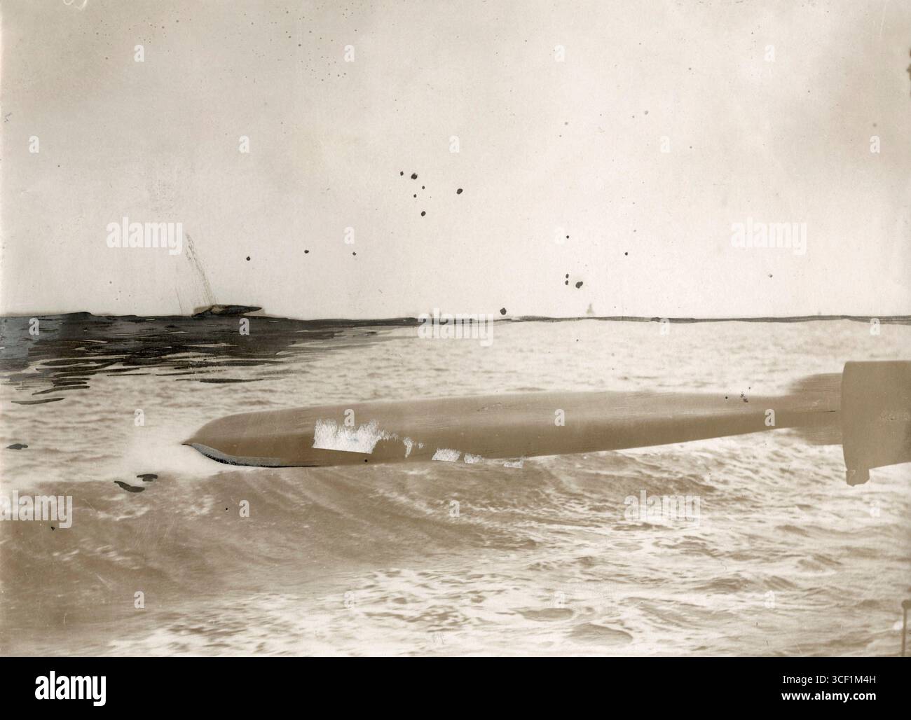 The firing of a British torpedo from a torpedo boat during World War I ...