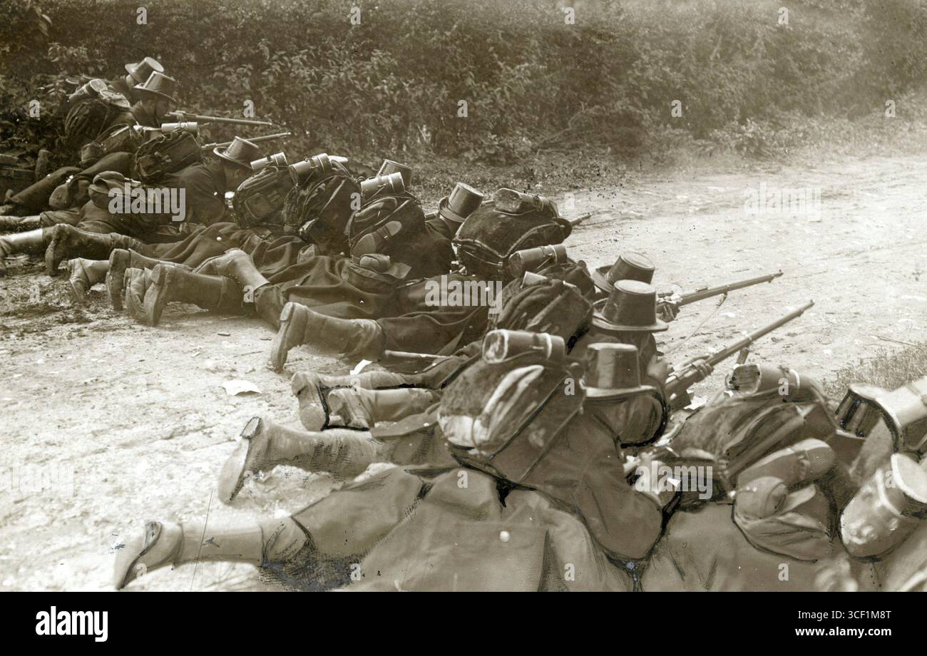 Belgian troops stand ready at the German border, preparing to face ...
