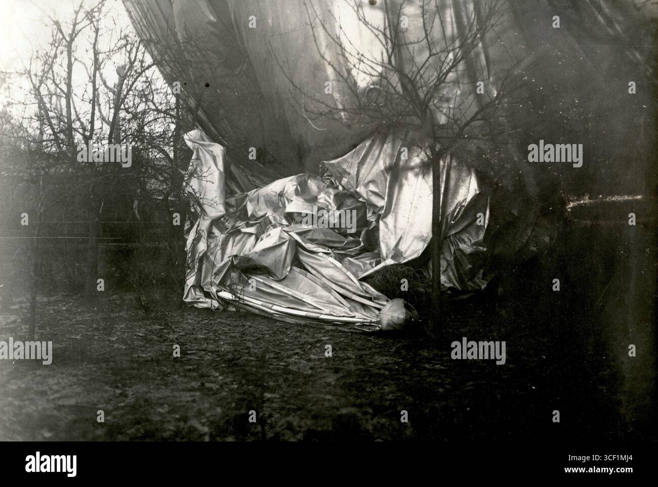 A detailed view of the damage to a British Zeppelin, which crashed into ...