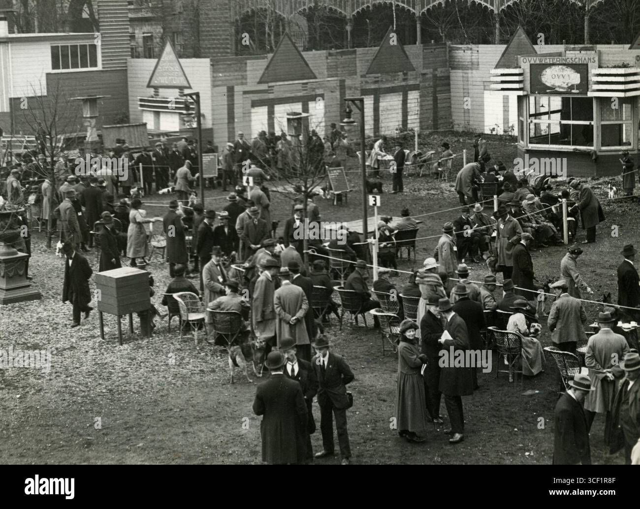 Crowds gather at a dog show in Amsterdam, 1922, as people wait their ...
