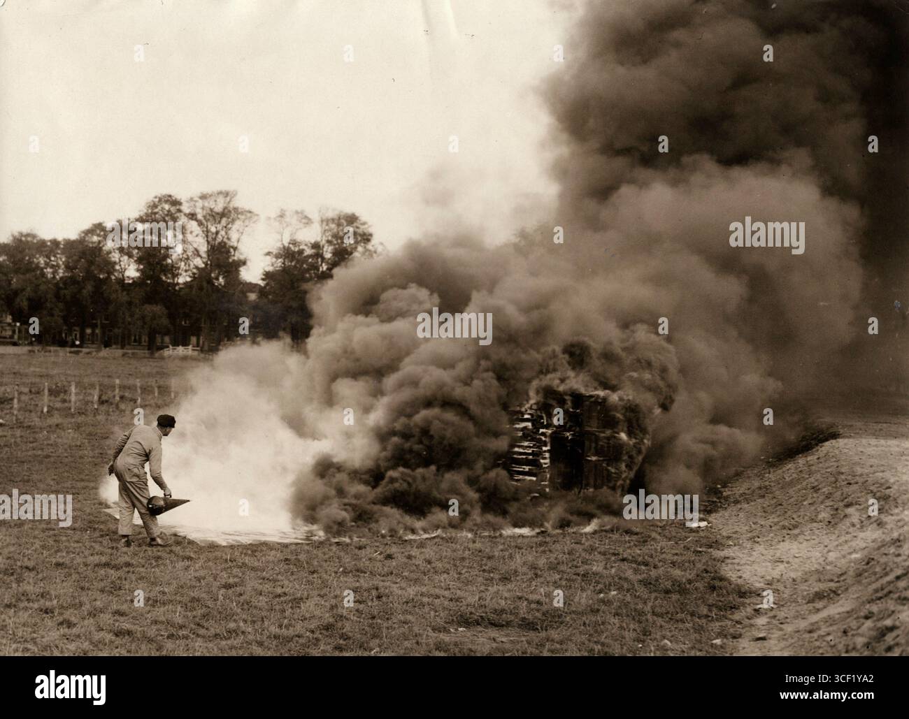 A 1926 demonstration of a foam-based fire extinguisher, likely an Iffa ...