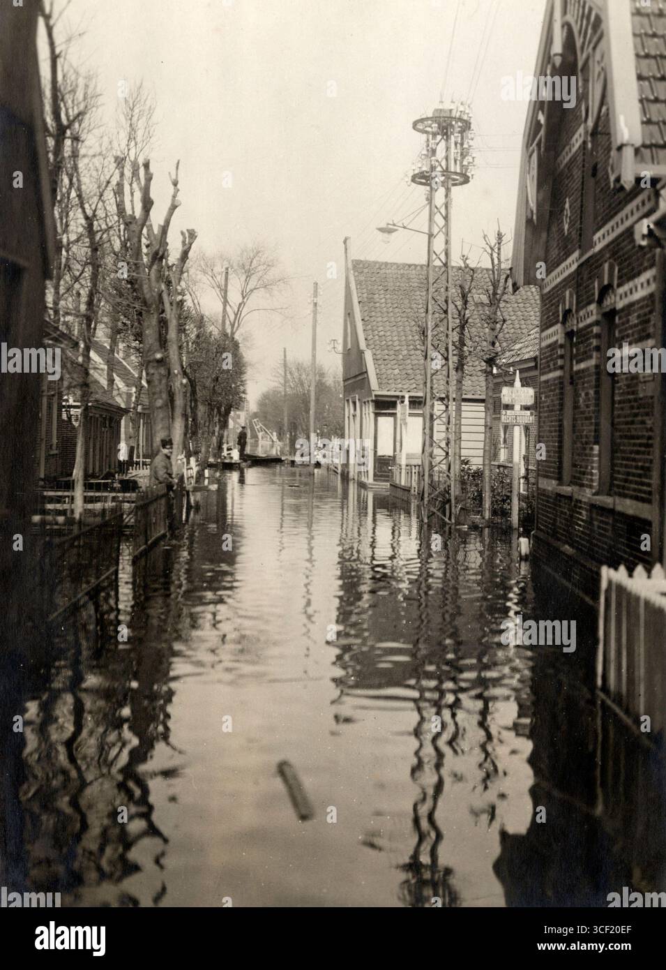 A flooded street in Landsmeer during the 1916 flood, with an ...