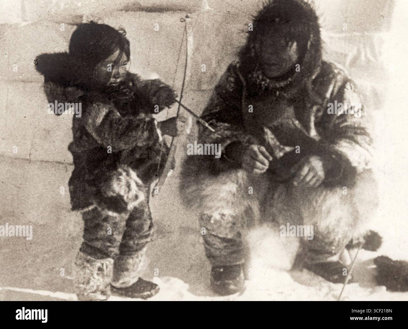 In 1922, a still from the film *Nanook of the North* shows an Eskimo ...