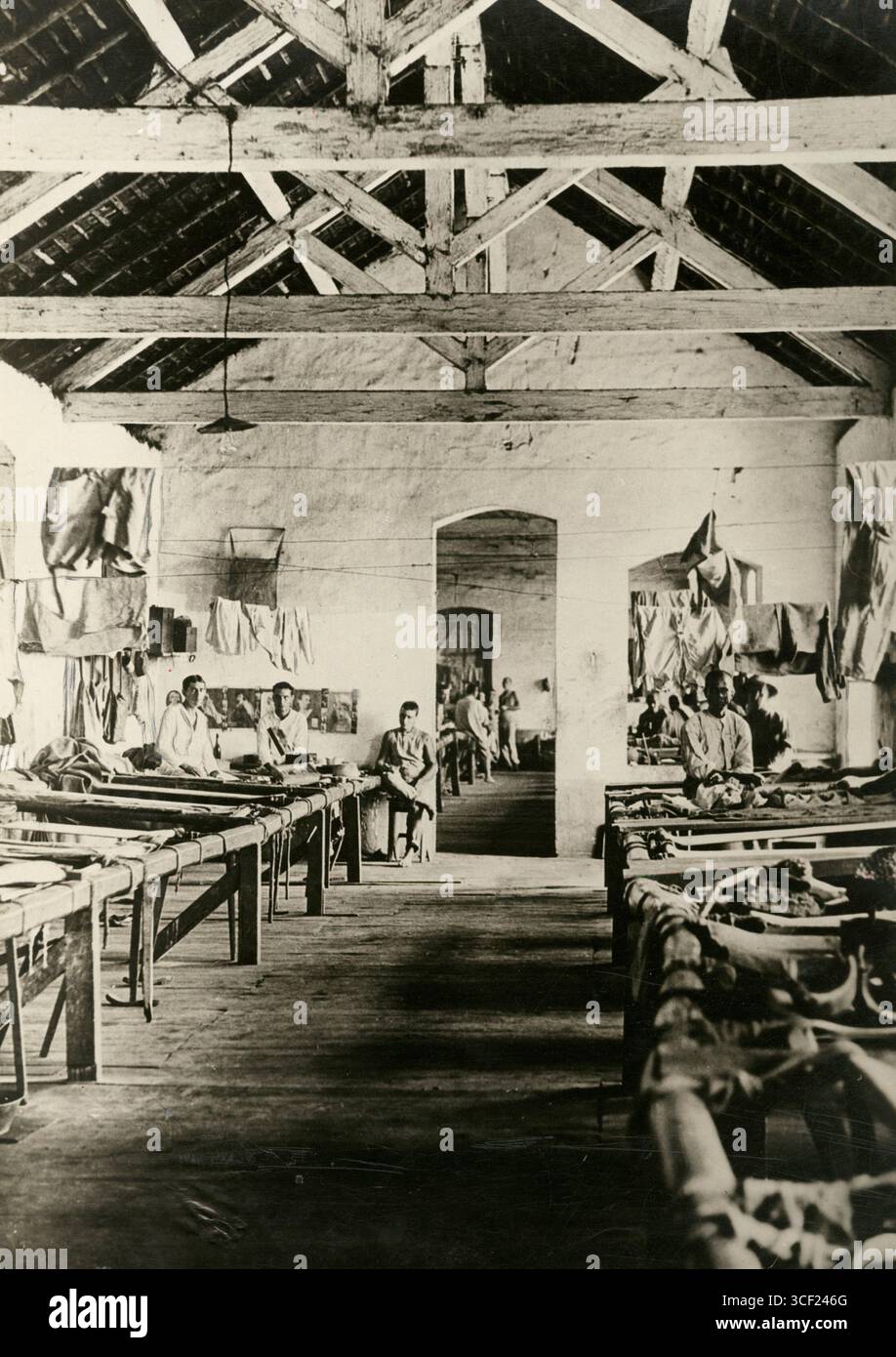 The image from 1929 shows a sleeping quarter in the penal colony on ...