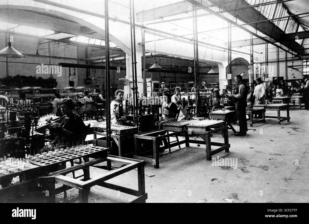 This photograph from 1921 shows the Pope lightbulb factory, which was ...