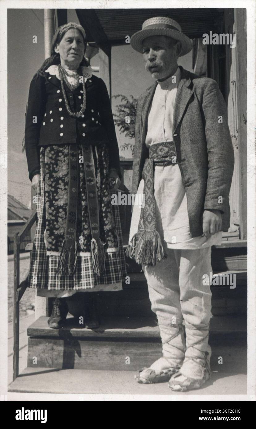 In 1935, a woman and a man dressed in traditional Dzkija national ...