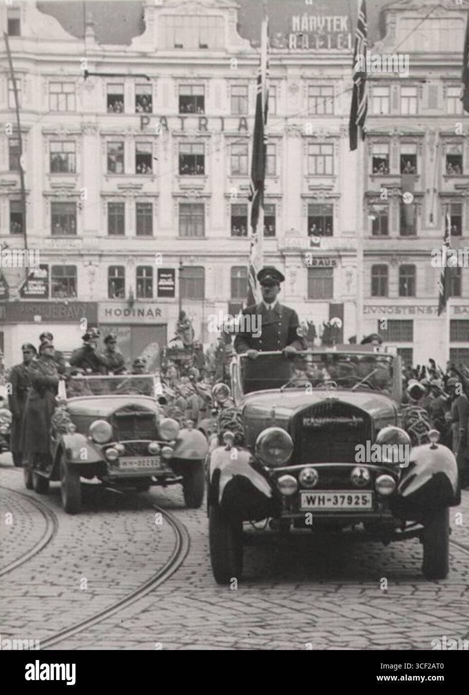 Adolf Hitler is seen driving through námestí Svobody in Brno ...