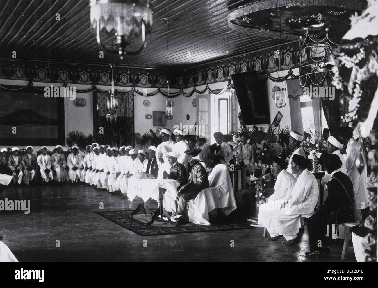 This photograph from 1930-1936 shows a gathering for the wedding of the ...