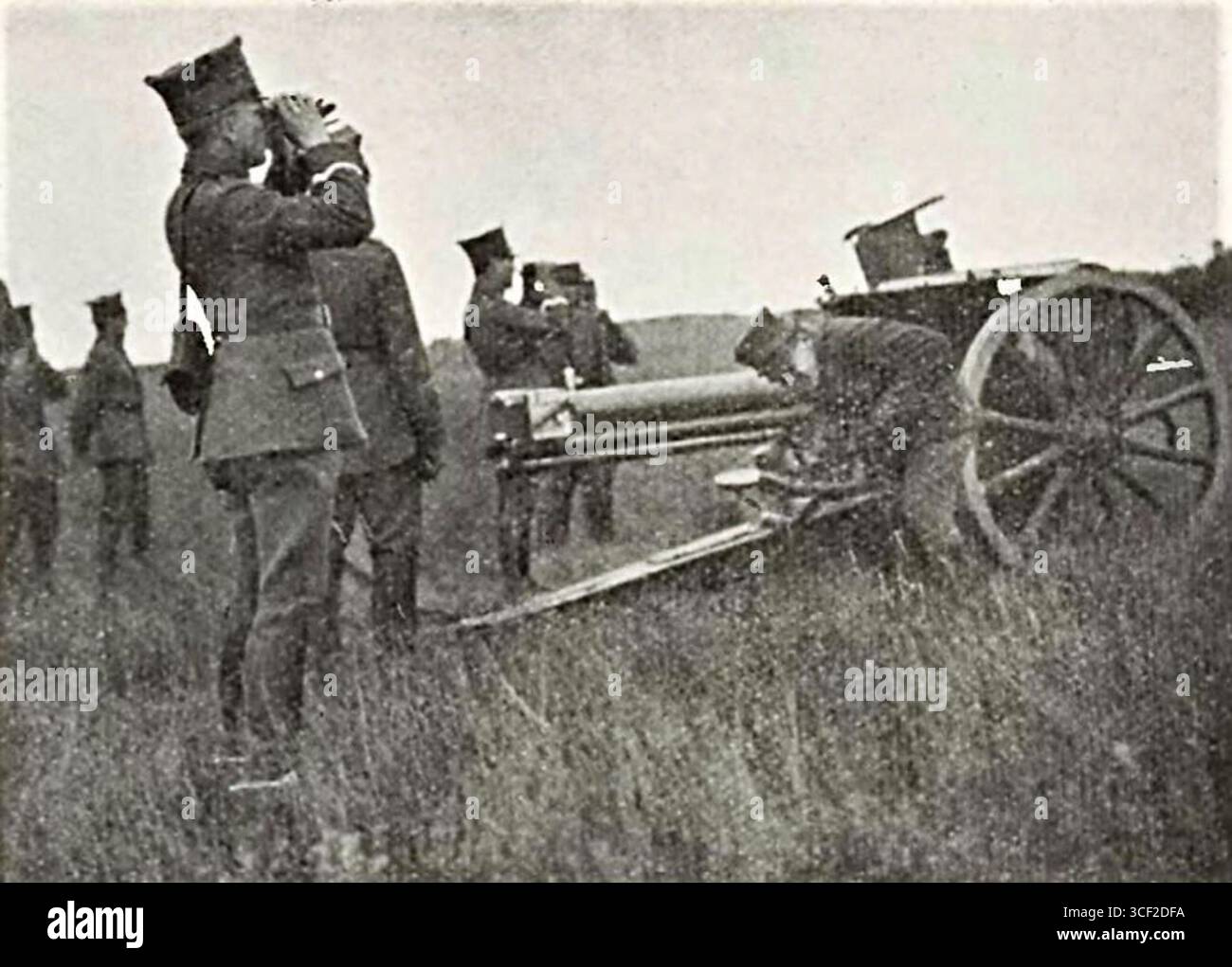 This 1937 photograph captures a live-fire artillery exercise with 75mm ...