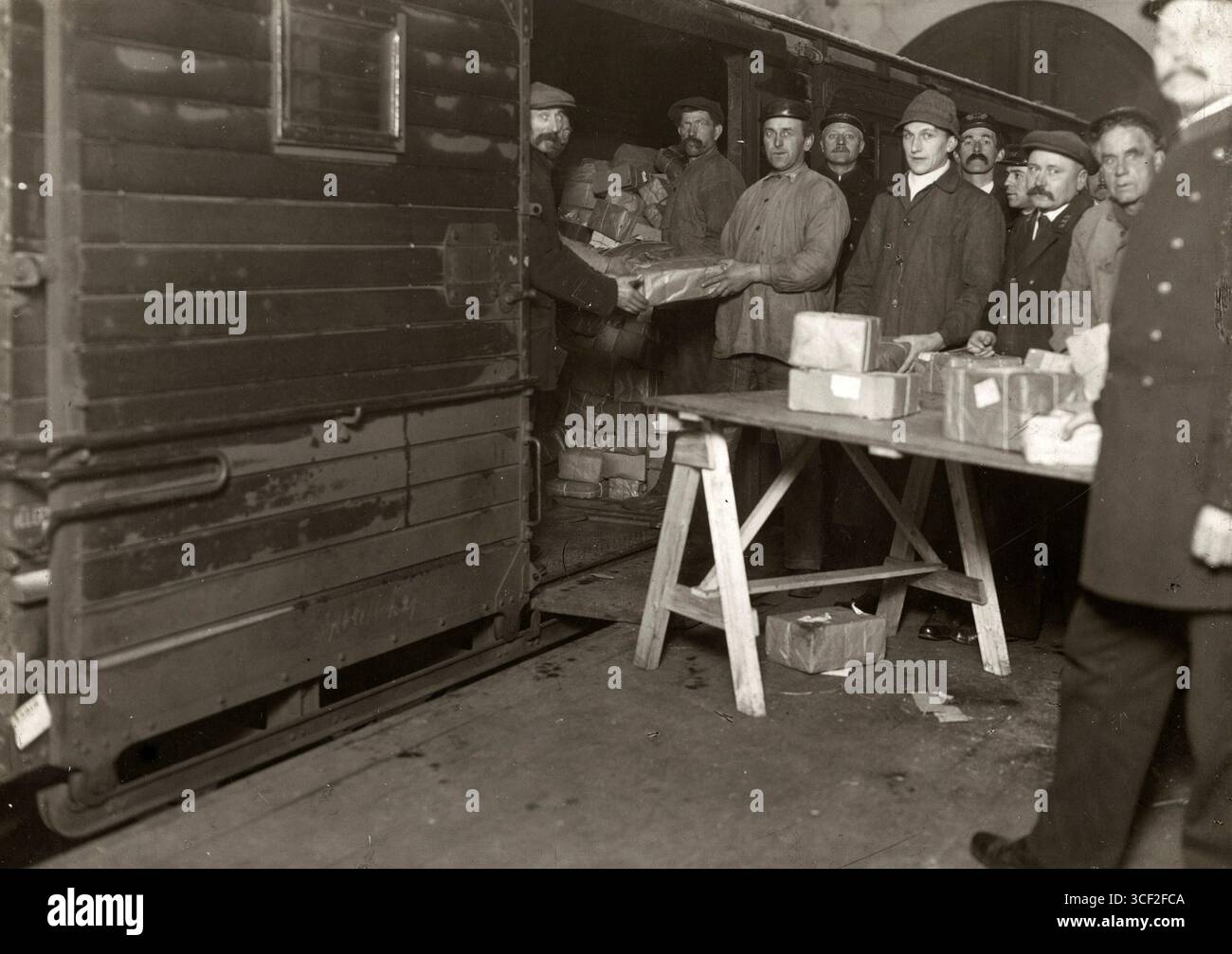 During World War I, Dutch civilians help transport packages destined ...