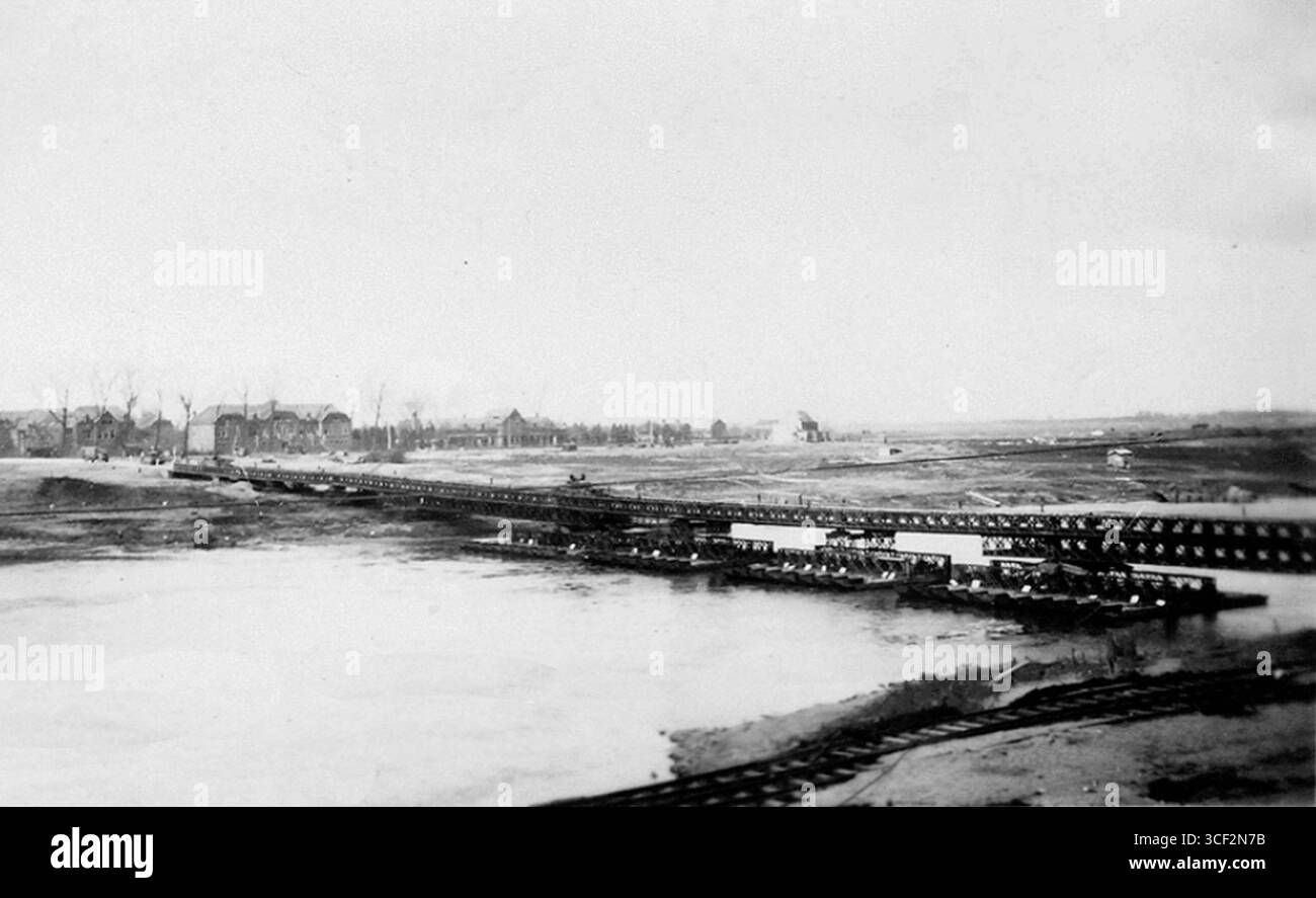 A 1945 photograph showing the Bailey pontoon bridge constructed by the ...