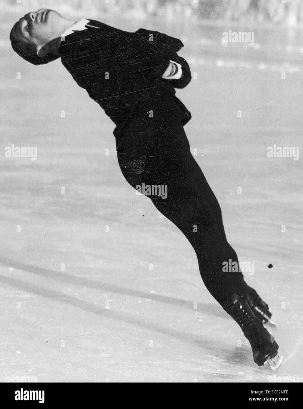 Freddie Tomlins performs an outside edge spread eagle at the 1939 ...