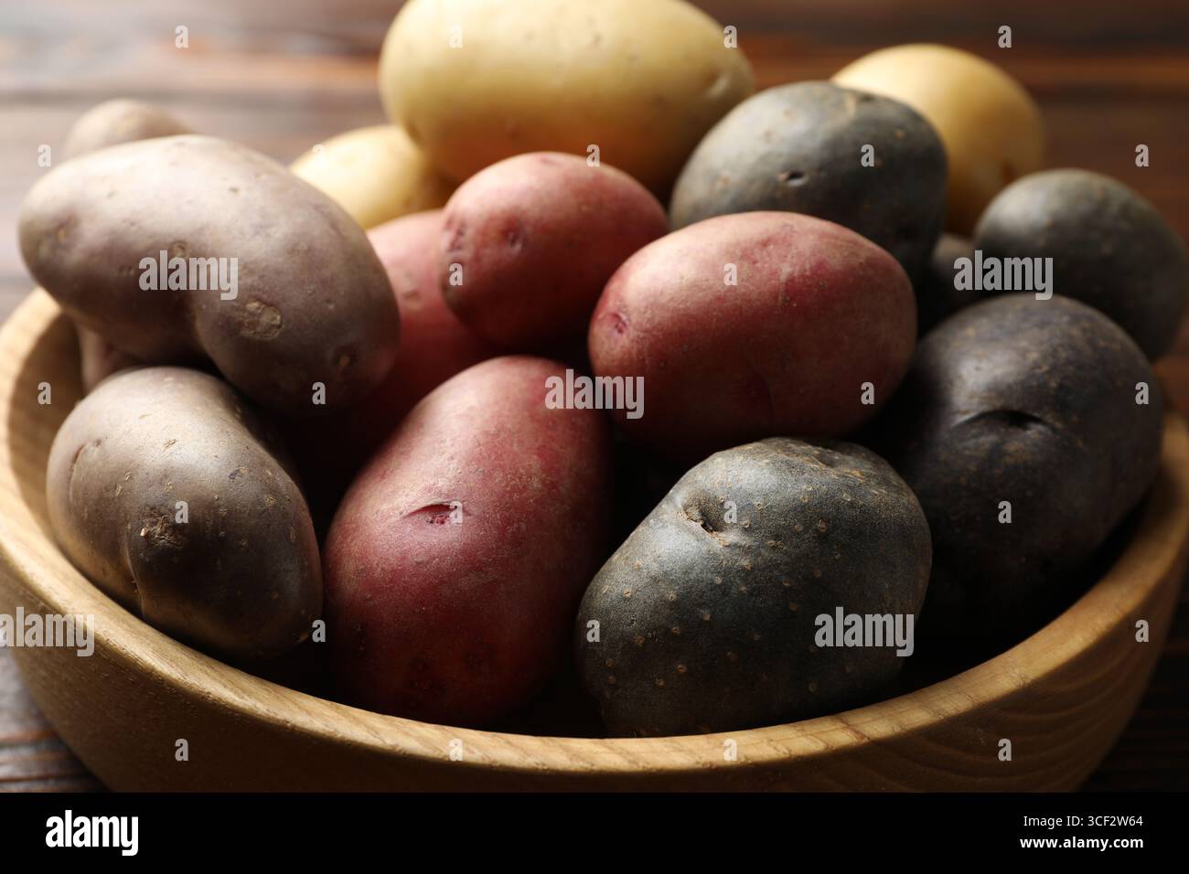 Different types potatoes in bowl hi-res stock photography and images ...