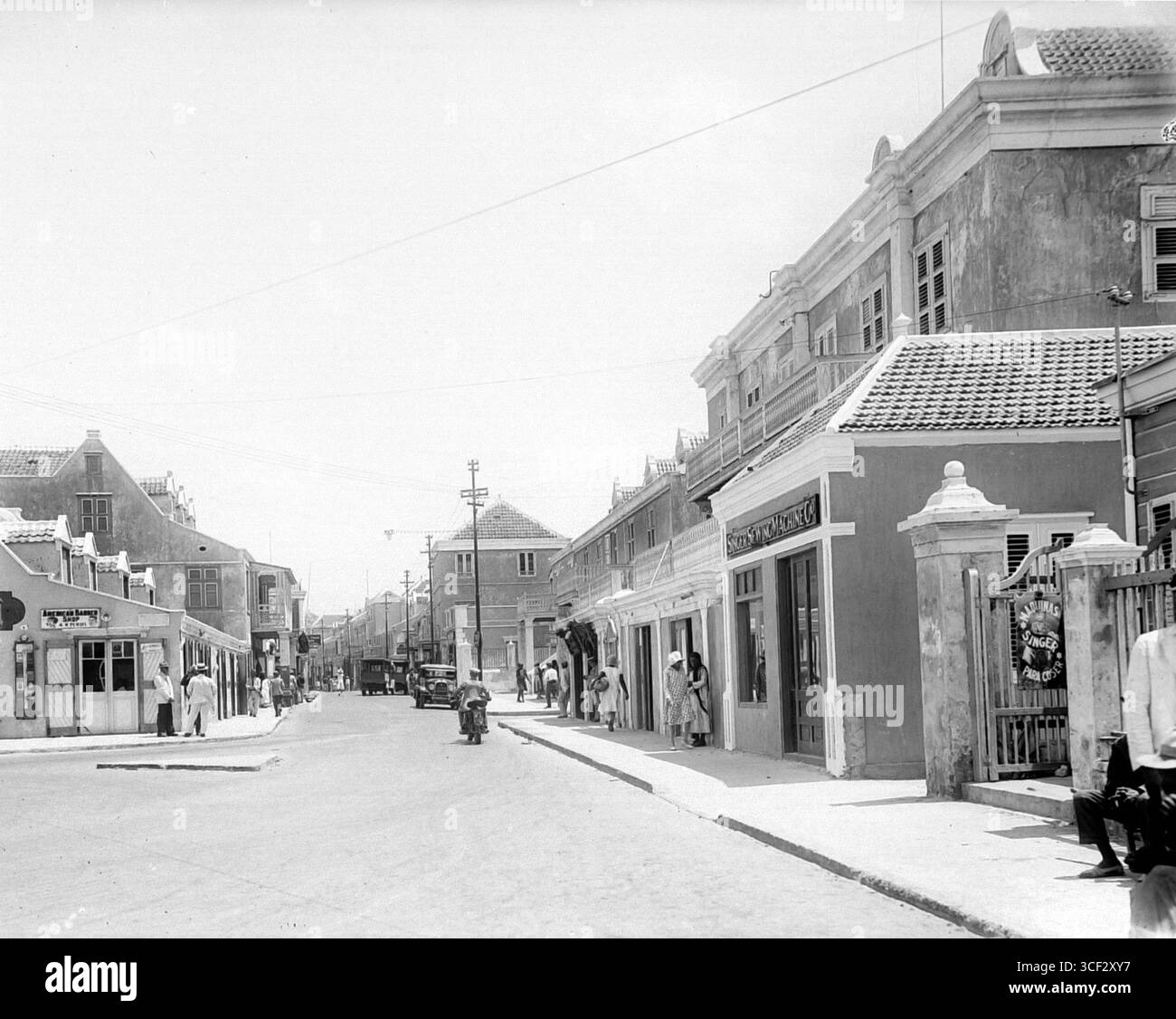 A negative photograph of a street scene in Willemstad, showing heavy ...