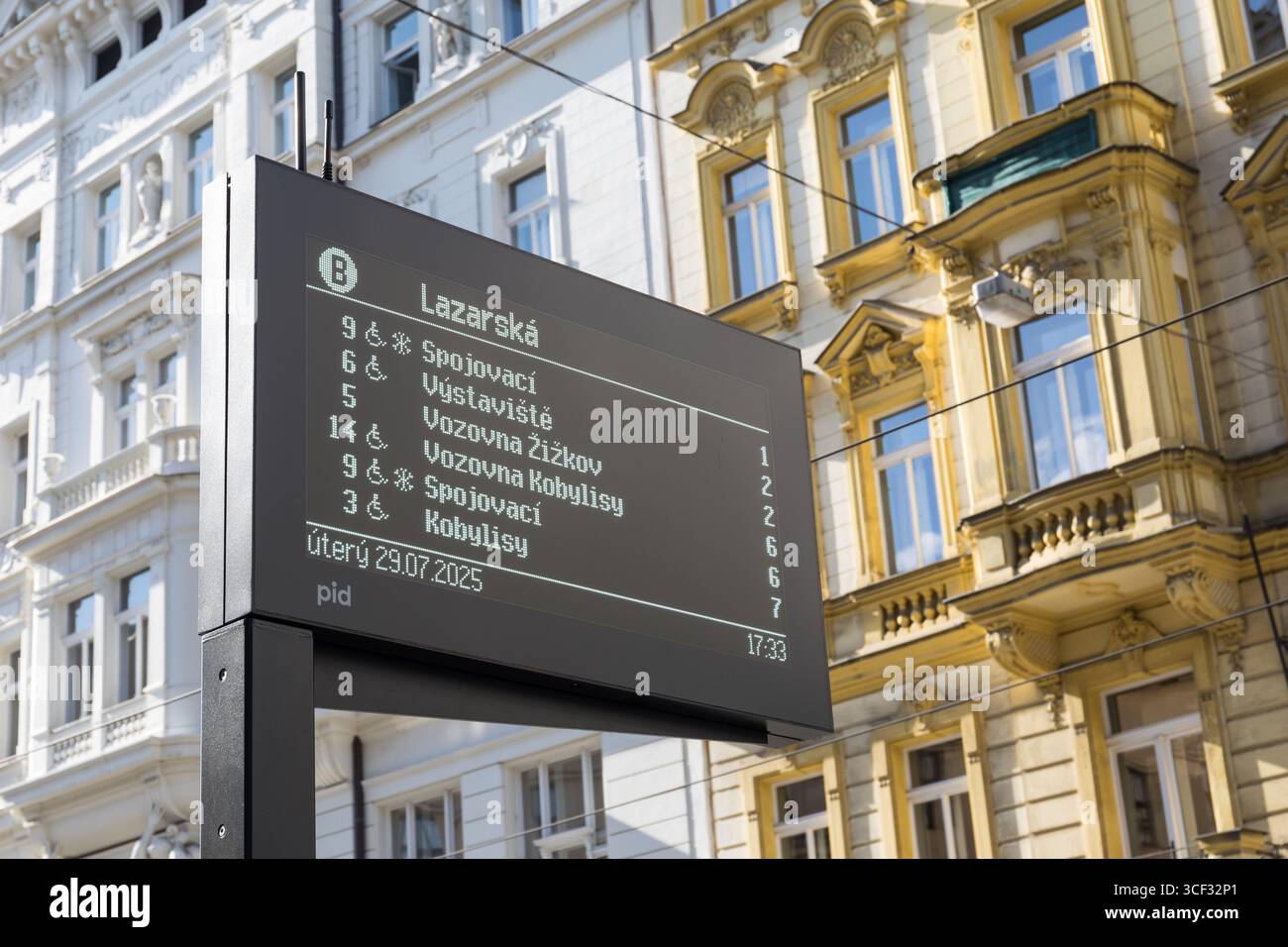 A tram stop display in Prague (Lazarská), showing tram numbers ...