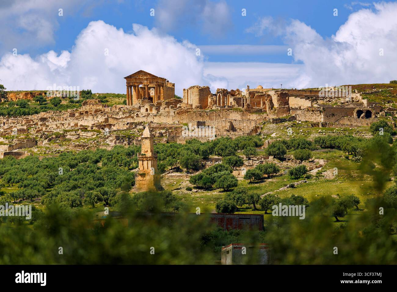 Ruins of ancient Thugga with capitol, thermal baths and Punic mausoleum ...